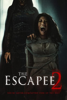 ‎The Escapee 2: The Woman in Black (2024) directed by Louisa Warren ...